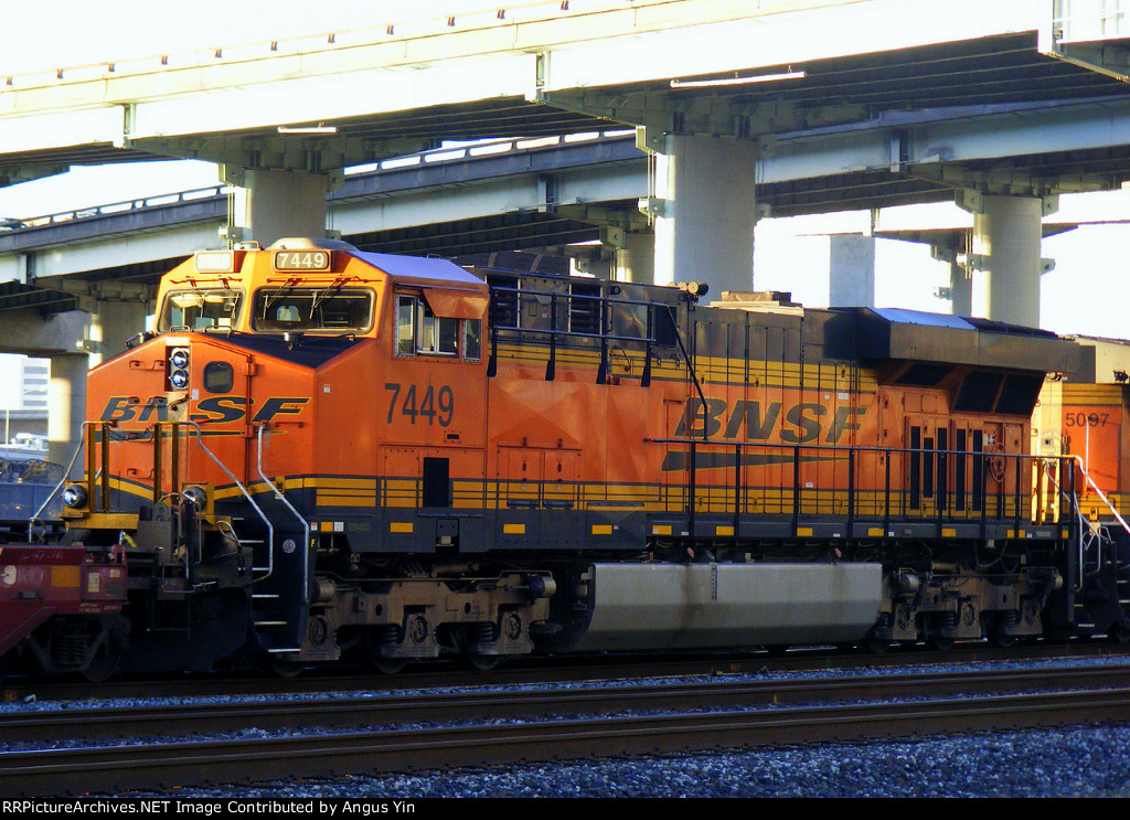 BNSF 7449 in freight under Interstate-80